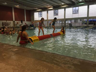 'It's log rolling night': Kids find fun, exercise in the pool
