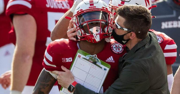 What are college football 'analysts' and what are they allowed to do?