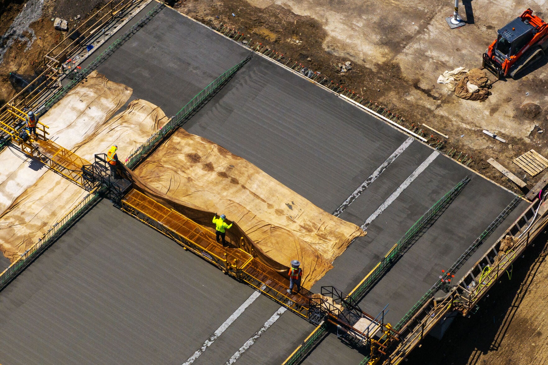 Photos: Workers pour concrete for Farnam Street bridge deck