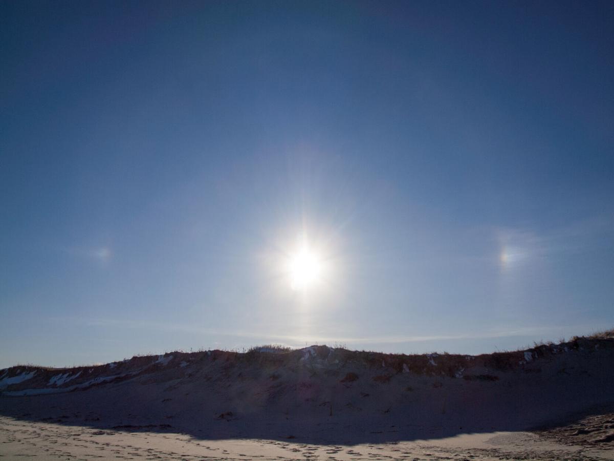 Defining the 'sun dog' and how they appear in the sky, even at night