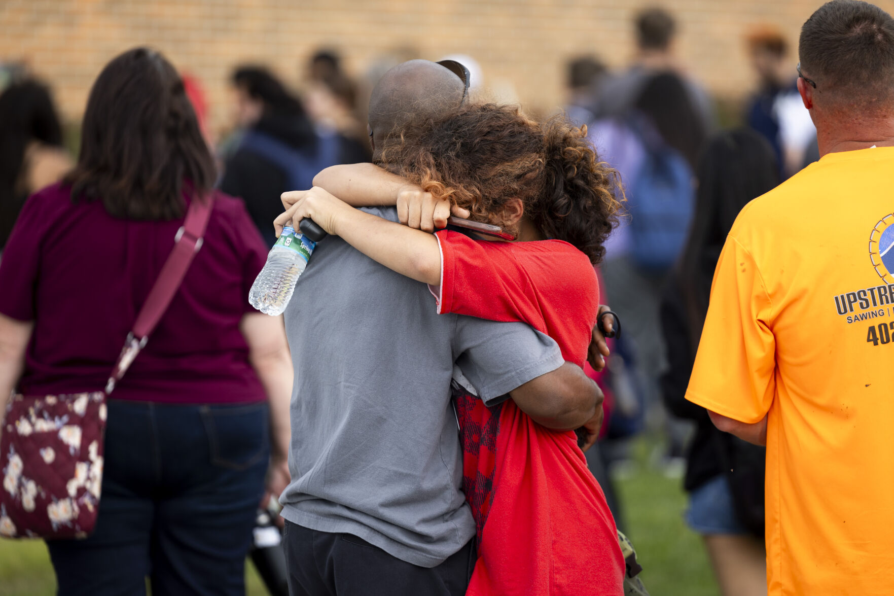 Students, parents reunited at Omaha Northwest after boy shot inside the ...