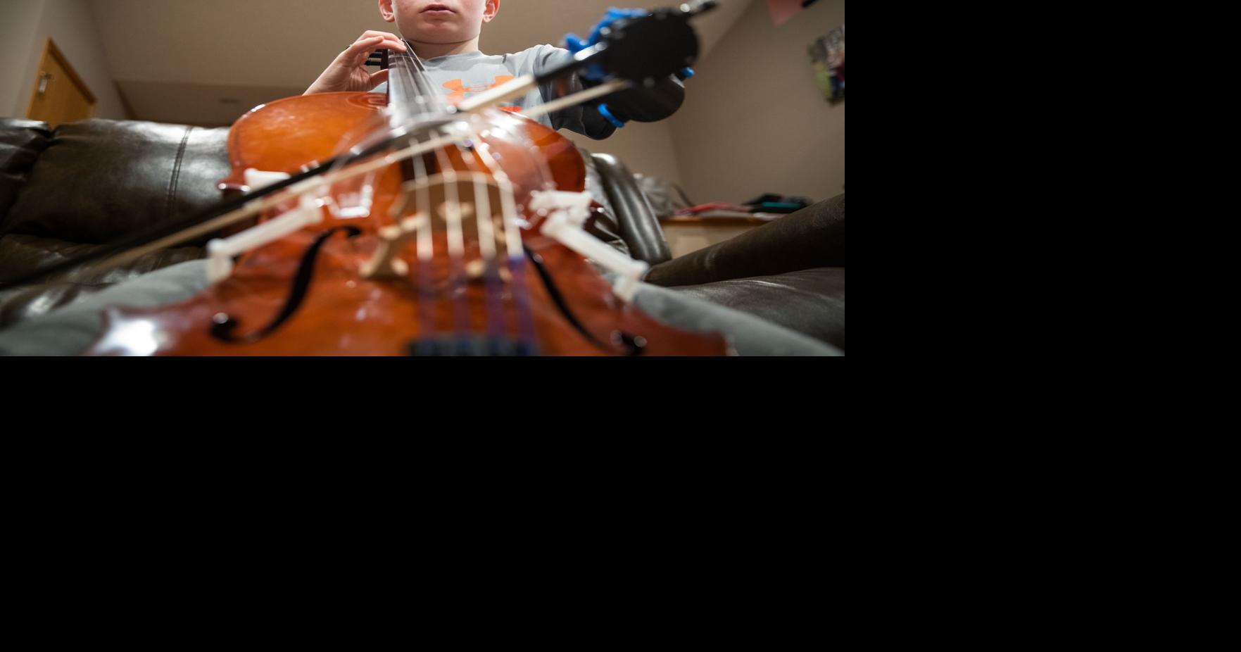 Lincoln boy learns cello — with help from a UNO-designed prosthetic device
