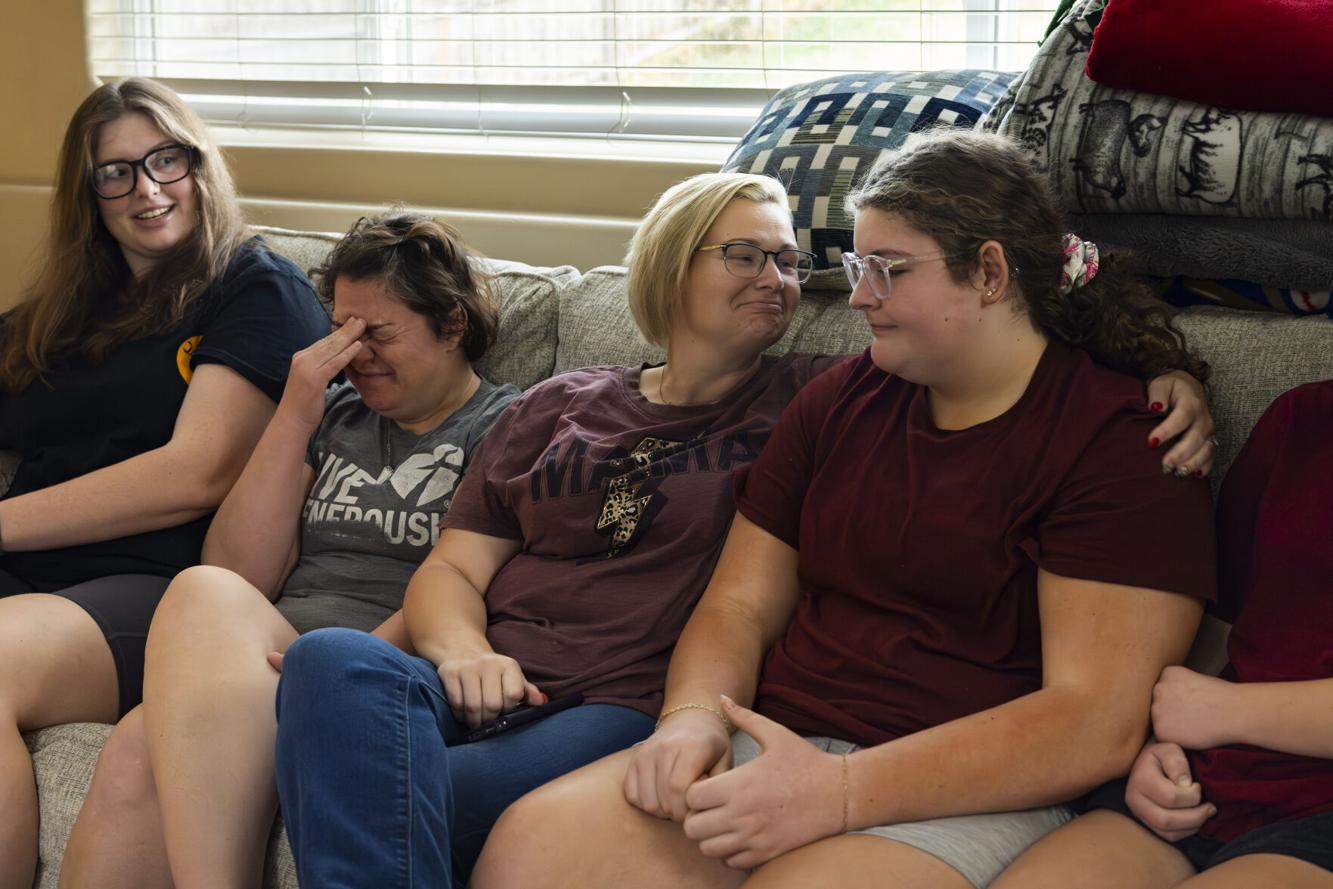 Hundreds gather for Omaha Westside teacher and husband following ...