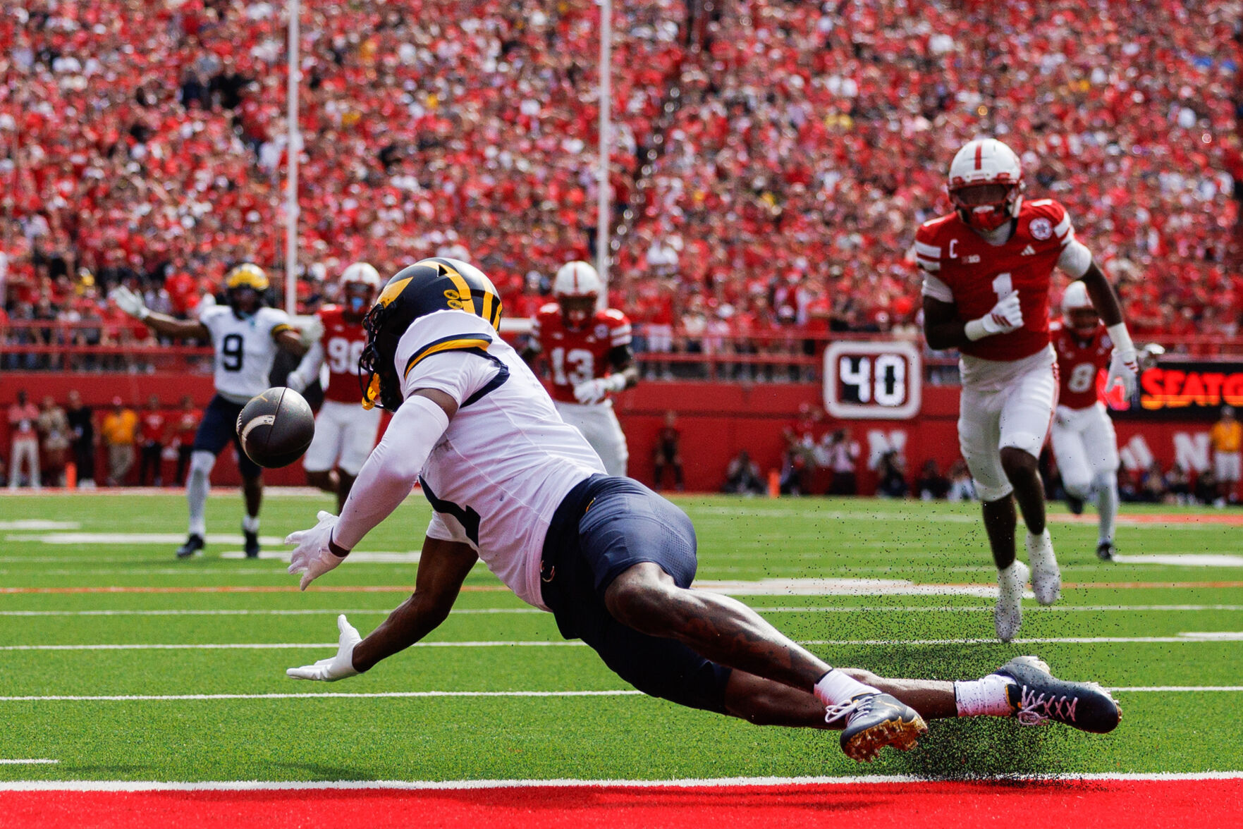 Michigan’s timeout oversight leads to Nebraska’s Hail Mary touchdown