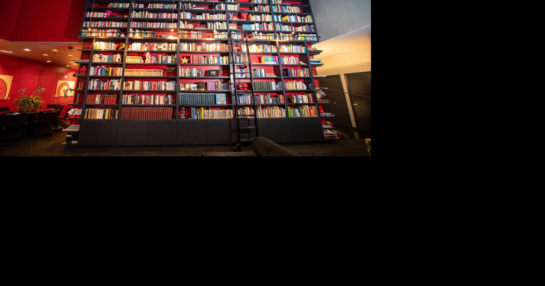 'As beautiful as any painting': Omahan's two-story bookcase is a work ...