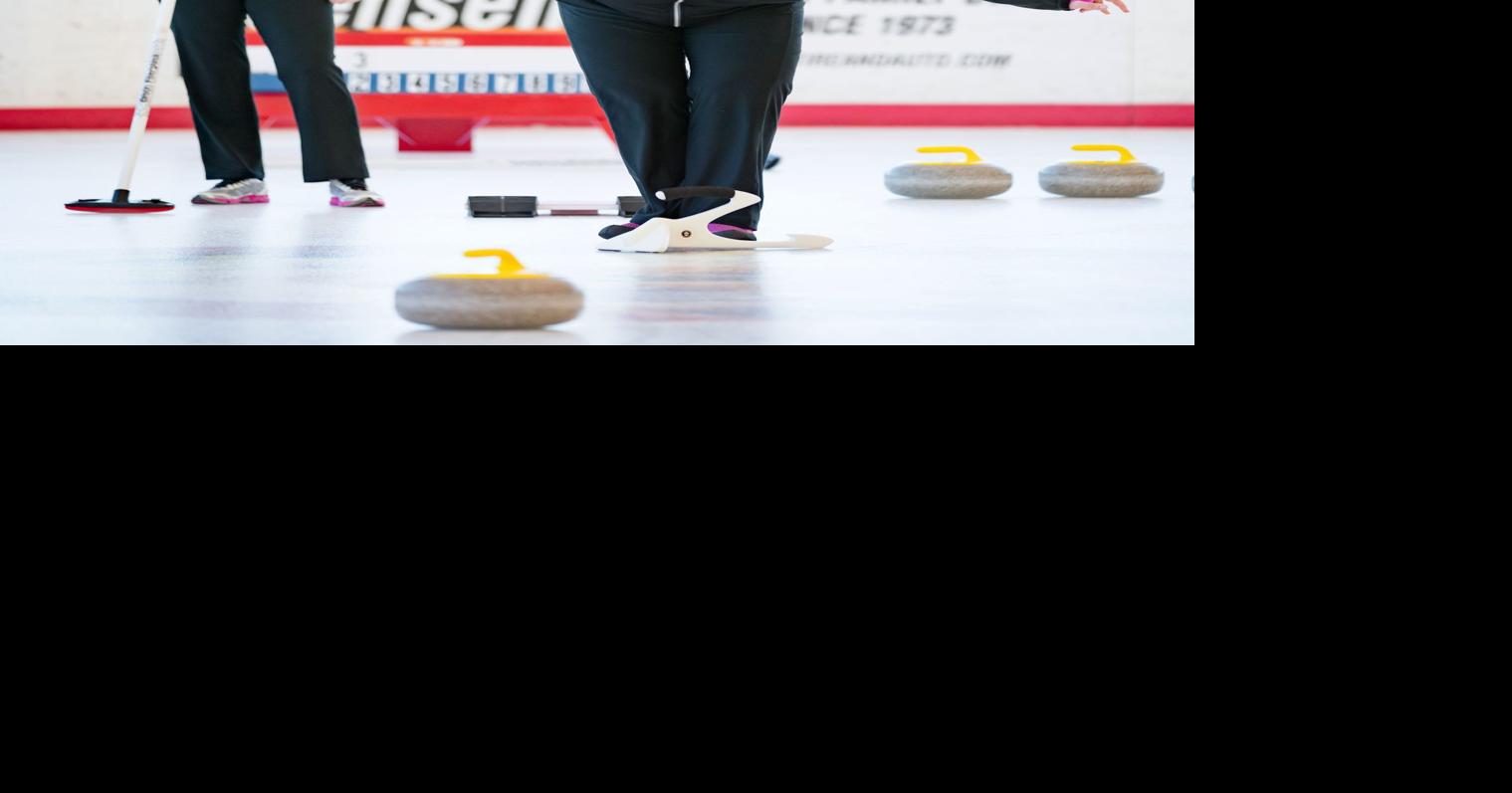 Beginners are swept up by curling frenzy during lesson at Baxter Arena