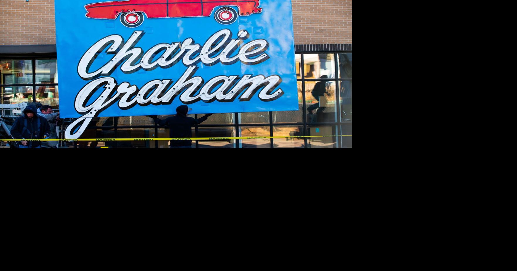 'Iconic' neon Charlie Graham auto sign on the move, again