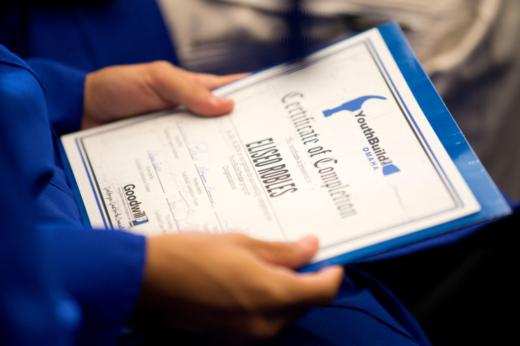 Proud parents, students at graduation for Goodwill job-training program