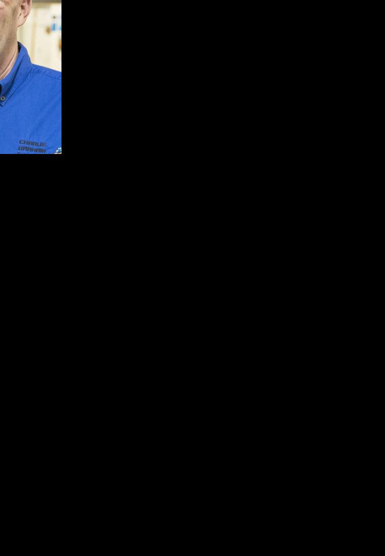 Charlie Graham auto shop and its iconic sign will move across ...