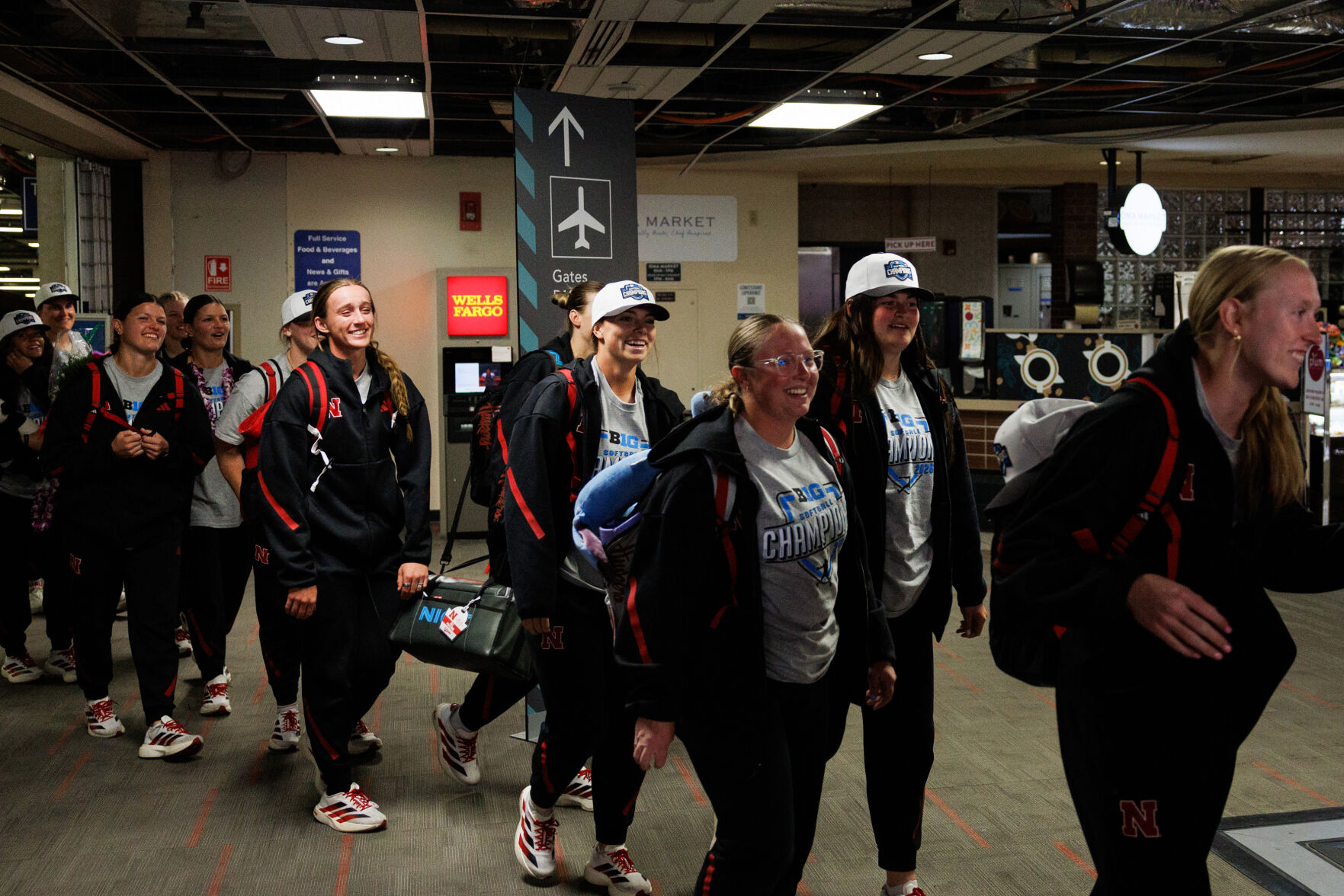 Photos: Nebraska softball greeted at Eppley Airfield by family and fans ...