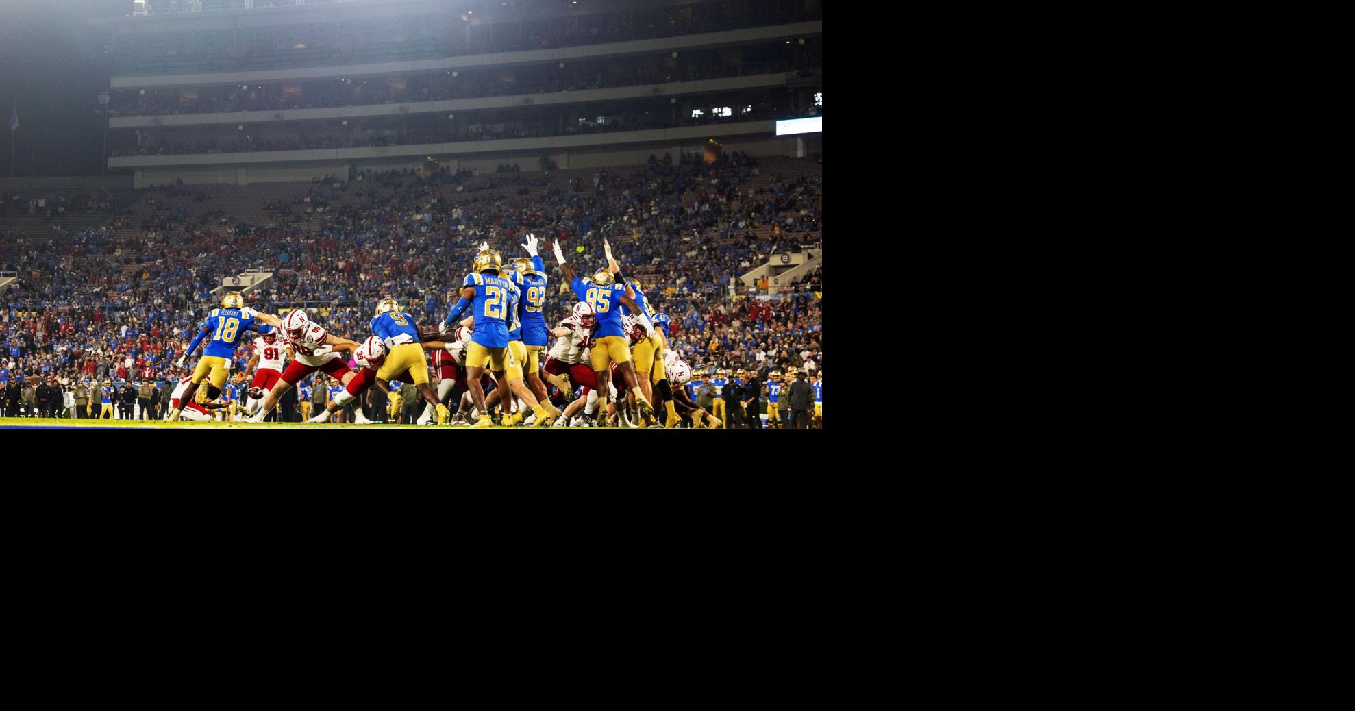 Nebraska's Kyle Cunanan (91) kicks the extra point during the first ...