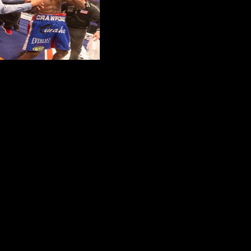 Crawford becomes Nebraska's first world champion boxer since 1914