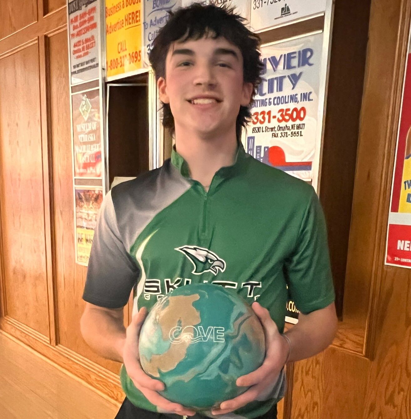 Perfect day: Two high school bowlers roll 300 games at the same time