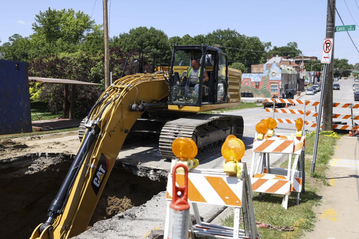 Sinkhole draws curious onlookers in midtown Omaha