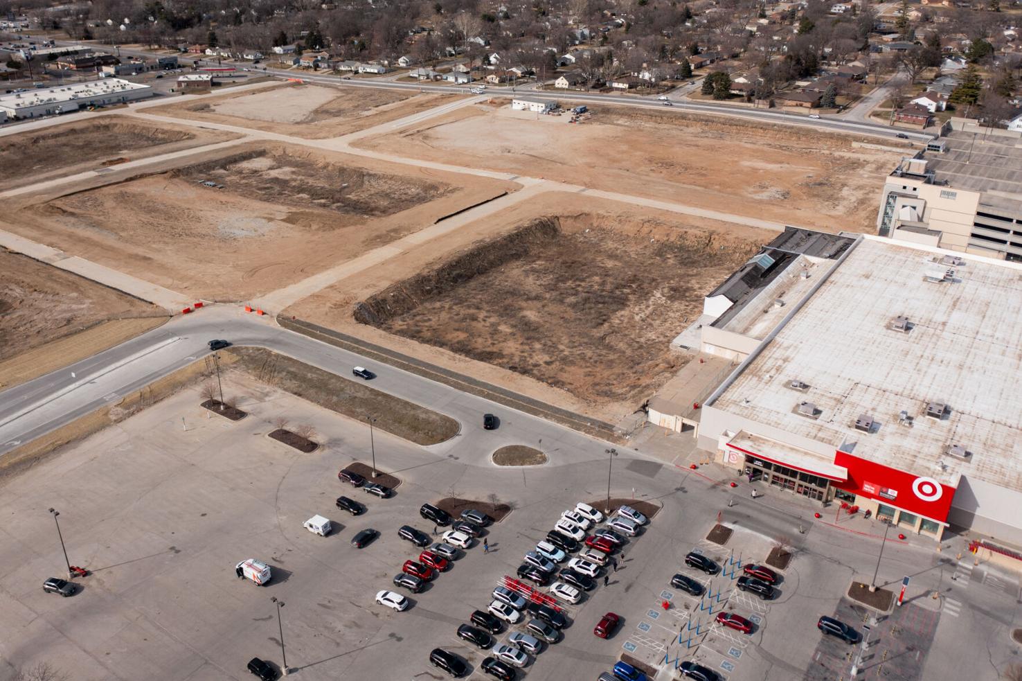 New Crossroads plan requires more money, bigger city role