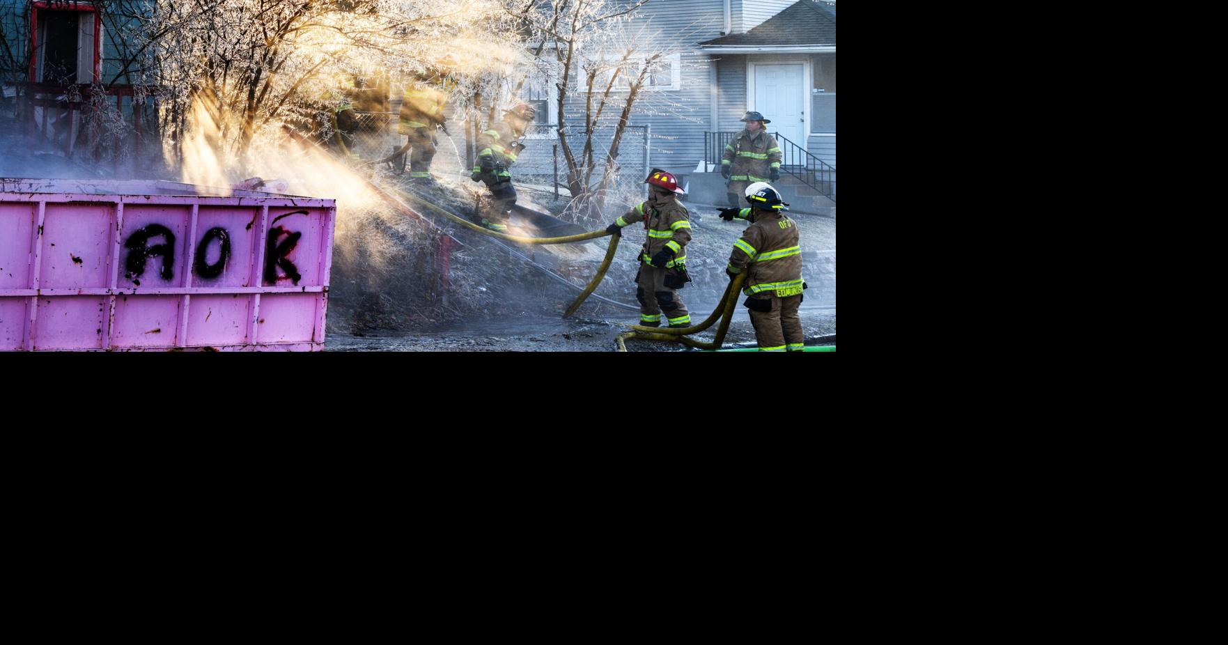 Photos: Omaha firefighters battle house fire near 40th and Izard Streets