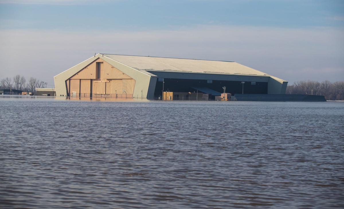 One-third of Offutt underwater; at least 30 buildings damaged in flood ...