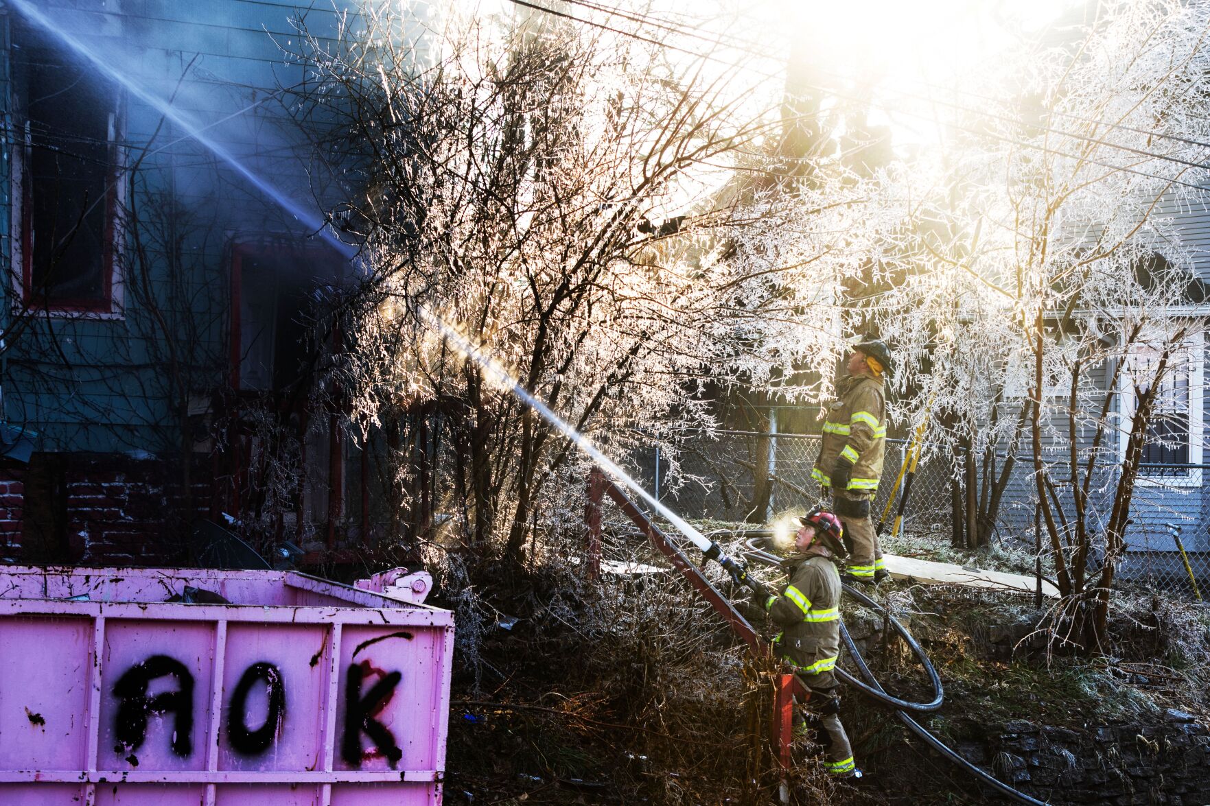 Omaha firefighters on defense during vacant house fire
