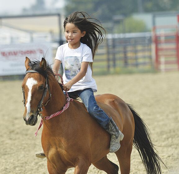 Racers run around the fairgrounds | Sports | omakchronicle.com
