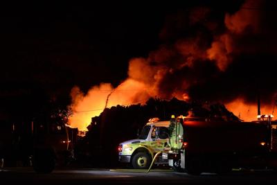 Crews respond to salvage yard fire | News | omakchronicle.com