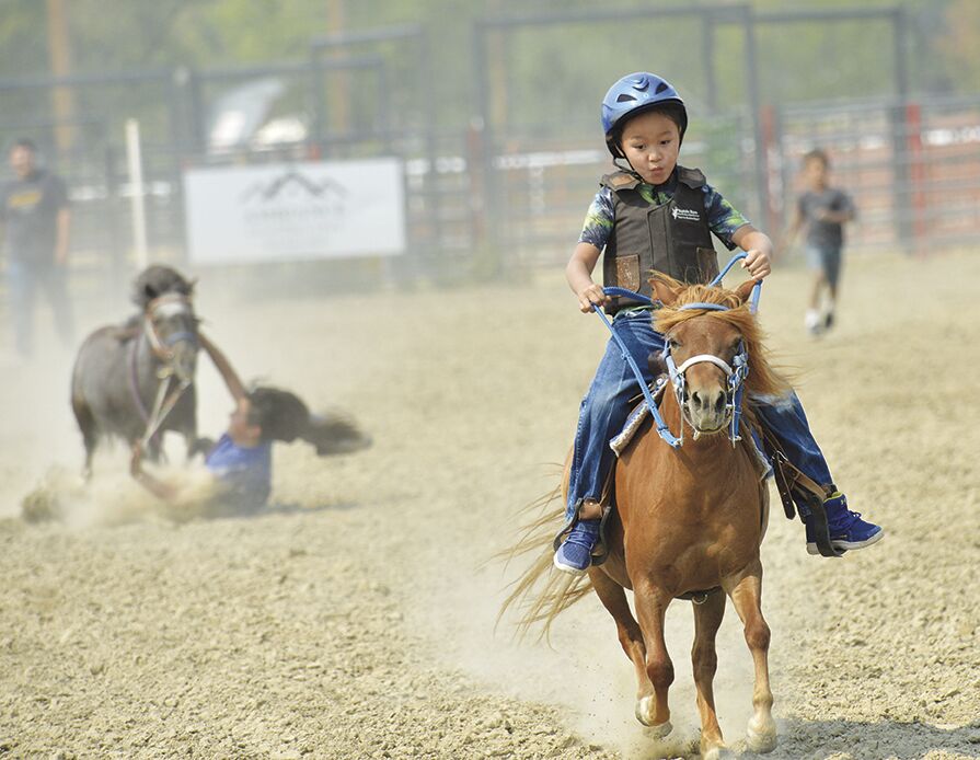 Racers run around the fairgrounds | Sports | omakchronicle.com