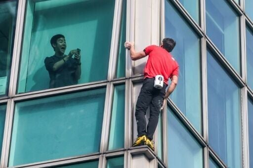American daredevil free-climbs Taiwan's tallest building | National ...