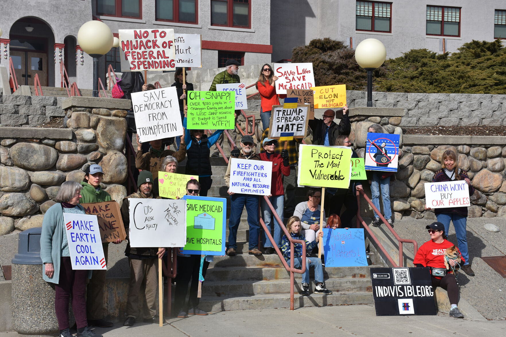 Residents protest Trump, Musk | News | omakchronicle.com