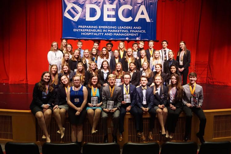 Sixteen OHS DECA students advance to state competition | Education ...