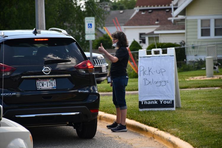 OSD students pick up materials left in the school since March ...