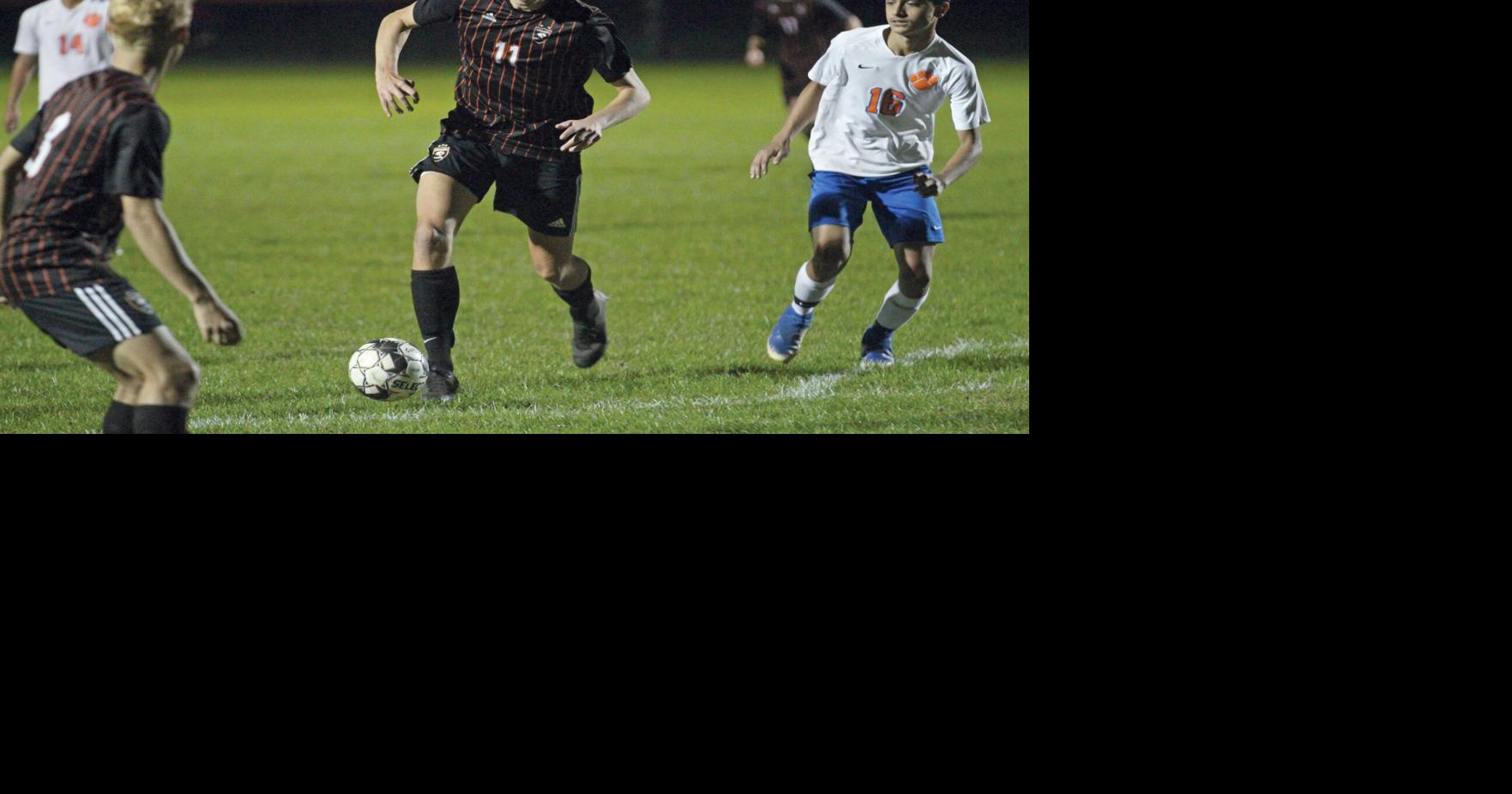 Boys soccer: Oregon overcomes gut check en route to regional title ...