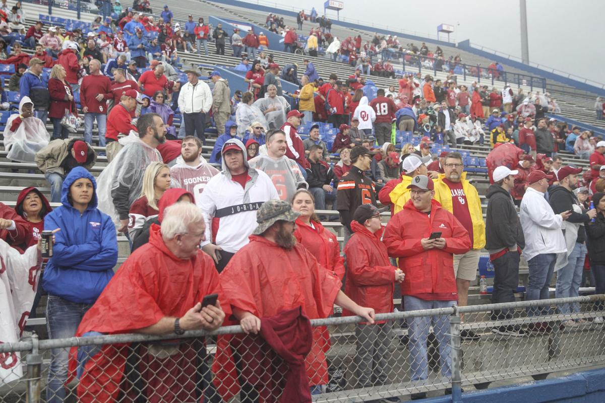 OU football: Sooner fans wait during weather delay in Lawrence, Kansas ...