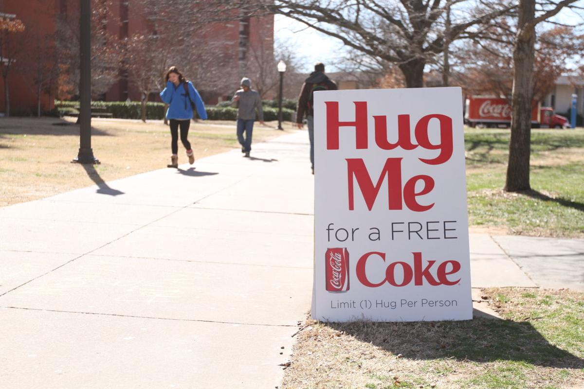 Get a Coke for a hug until 2 p.m. | L And A | oudaily.com