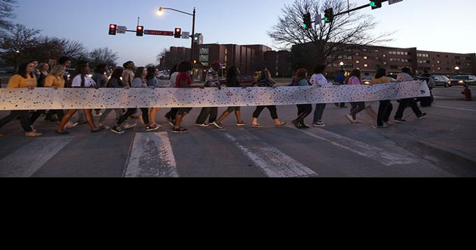Students march to SAE house in hope of inspiring change on campus ...