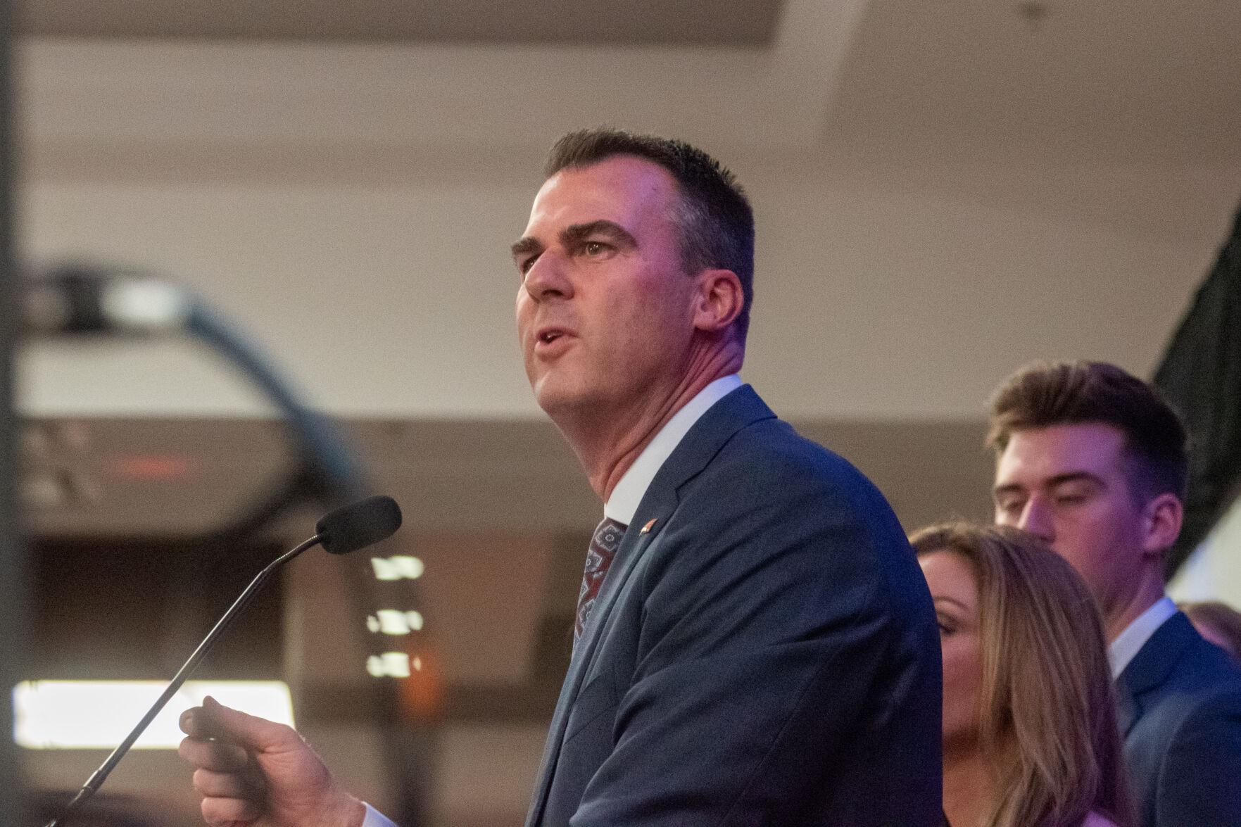 Gov. Kevin Stitt signs controversial immigration bill, launches task ...