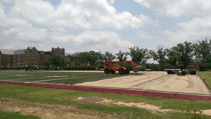 Oklahoma football: Construction crews tear up turf field behind stadium ...