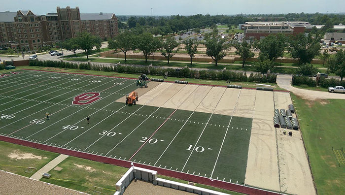 Oklahoma football: Construction crews tear up turf field behind stadium ...