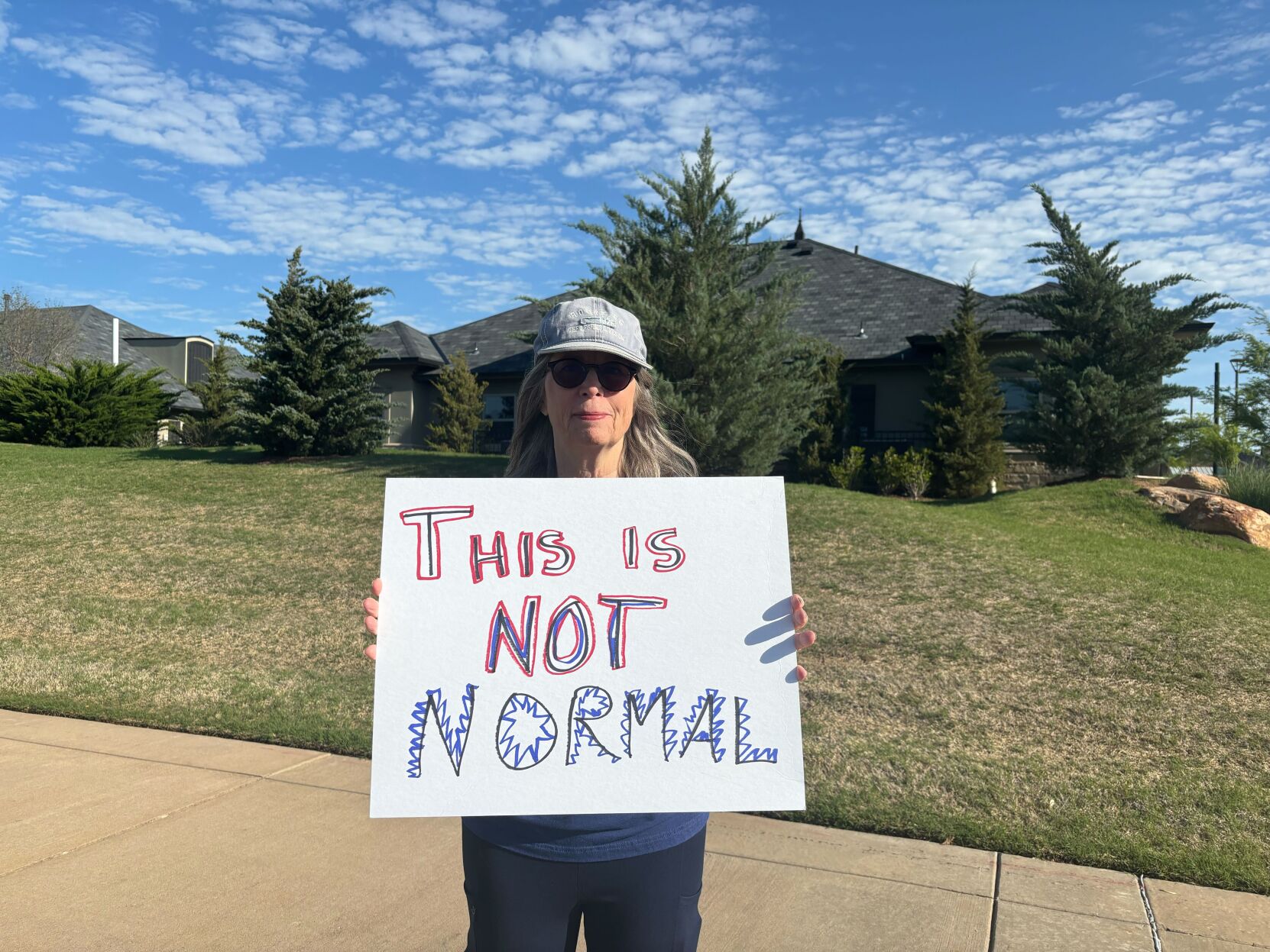 Local environmental group protests outside Tom Cole’s office | News ...