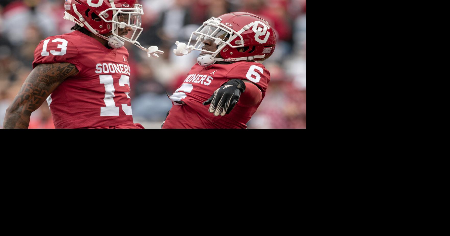 J.J. Hester and Deion Burks celebrate | | oudaily.com