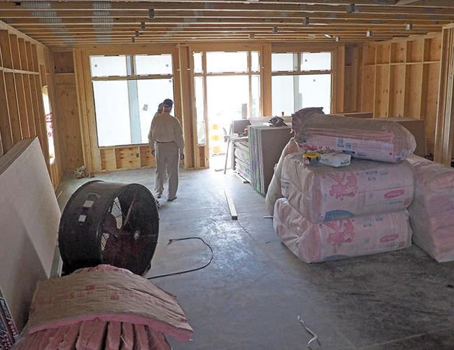 Mixed-use Evans building taking shape | Local & State ...