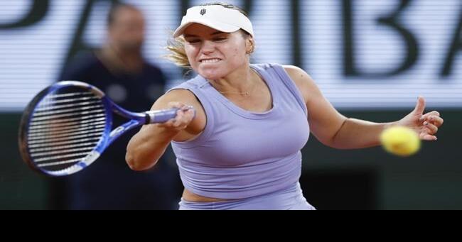 Iga Swiatek saves a match point and comes back to beat Naomi Osaka at the French Open | World ...