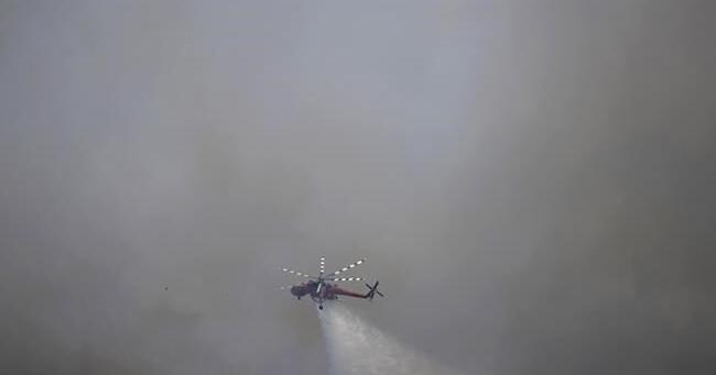 Wildfires in Greece close highways and threaten an oil refinery, as the ...