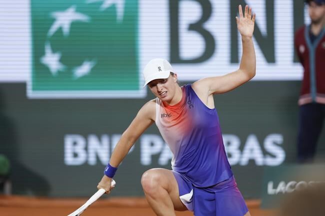 Iga Swiatek saves a match point and comes back to beat Naomi Osaka at the French Open | World ...