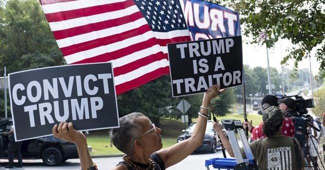 Mug shot of Donald Trump shows scowling former president during speedy ...