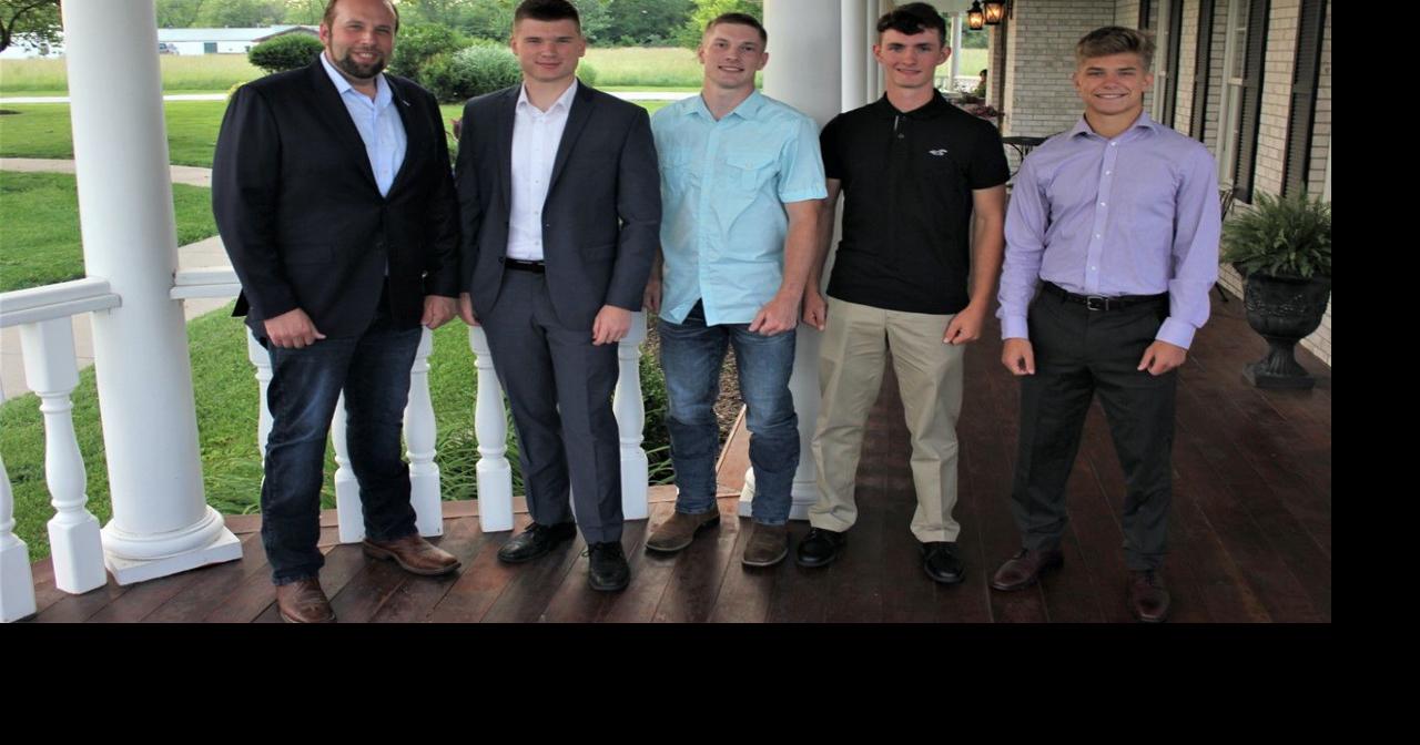 Smith congratulates Dathan Mickem of Rolla High School on receiving ...