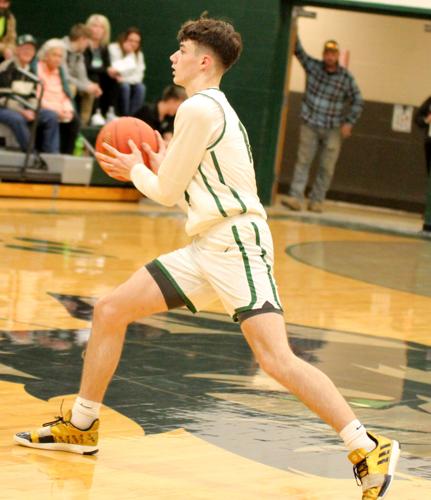 BOYS BASKETBALL: Wolves thrash Richland in regular-season finale ...