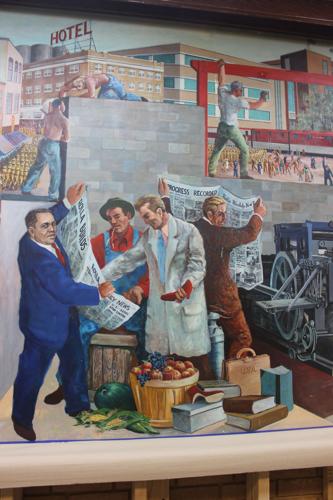 Dan Woodward restoring The Rolla Mural | | phelpscountyfocus.com