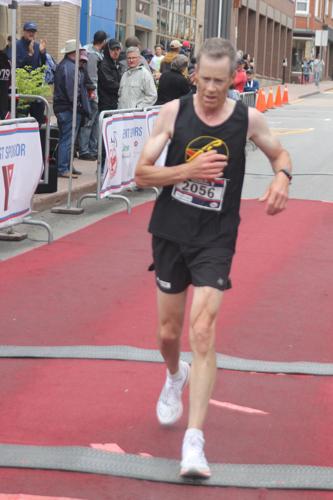 Local runners fare well at Johnny Miles events | Community ...