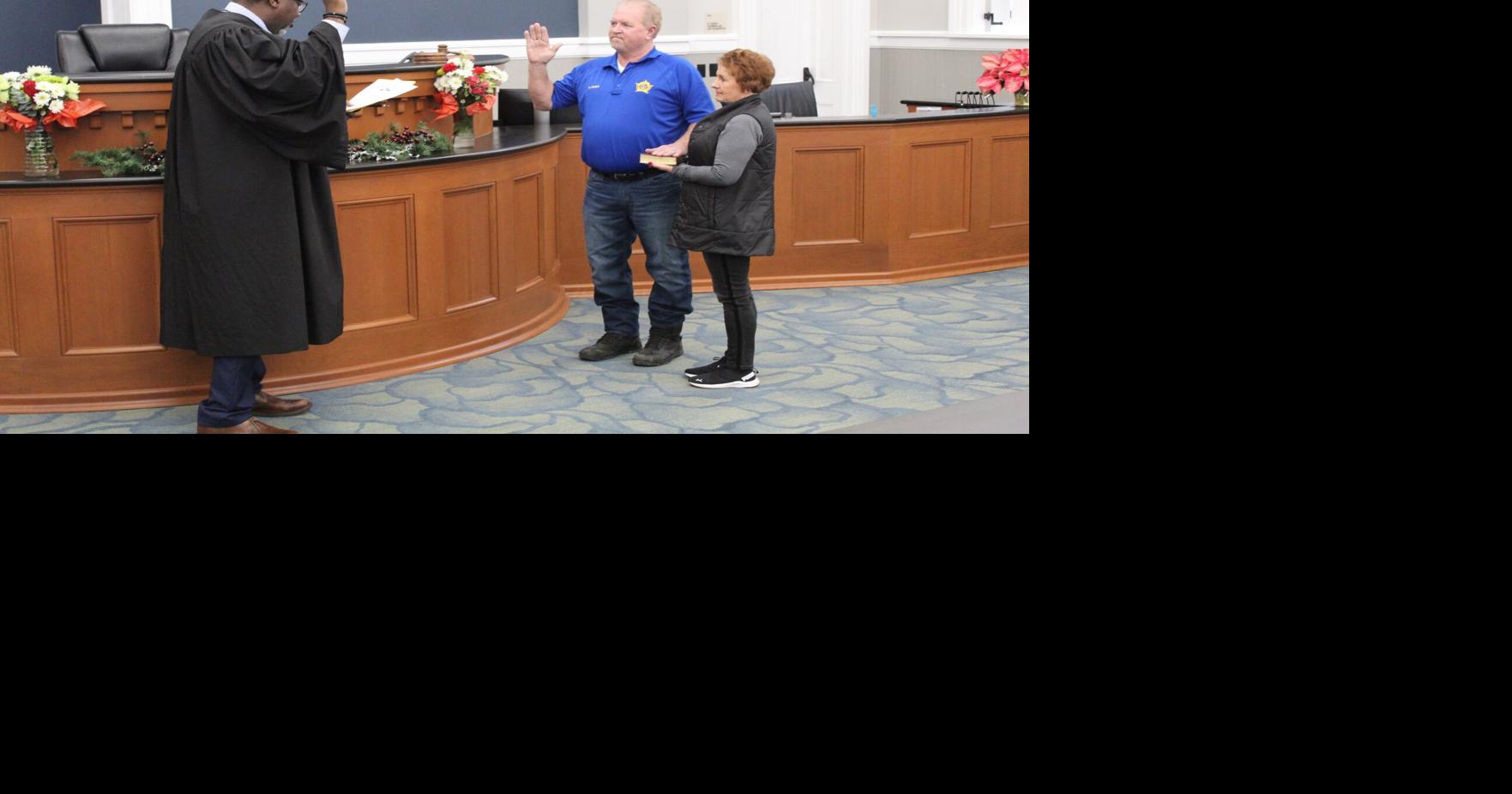 Coroner Mike Paris and his deputies were sworn into office by Judge ...