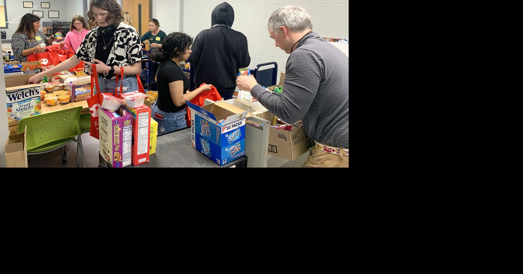 Seniors deliver food with help from Independence Bank employees ...