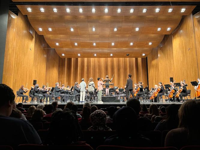 Sharing the spotlight: Parents credit music teacher for daughter’s ...